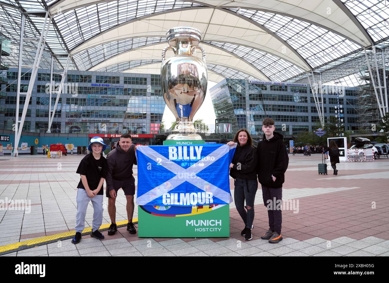 Scotland fans next to giant trophy outside Munich Airport. Germany will ...