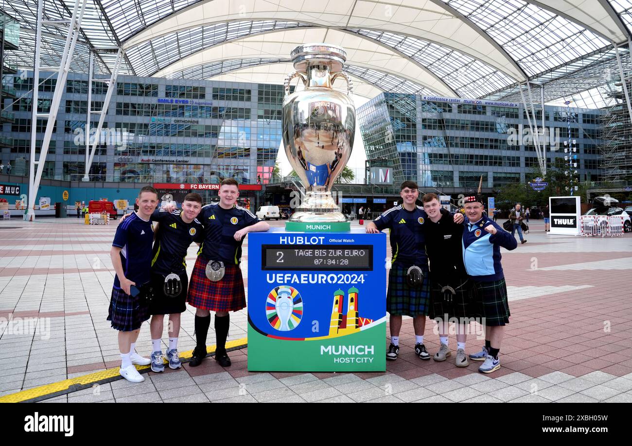 Scotland fans next to giant trophy outside Munich Airport. Germany will ...