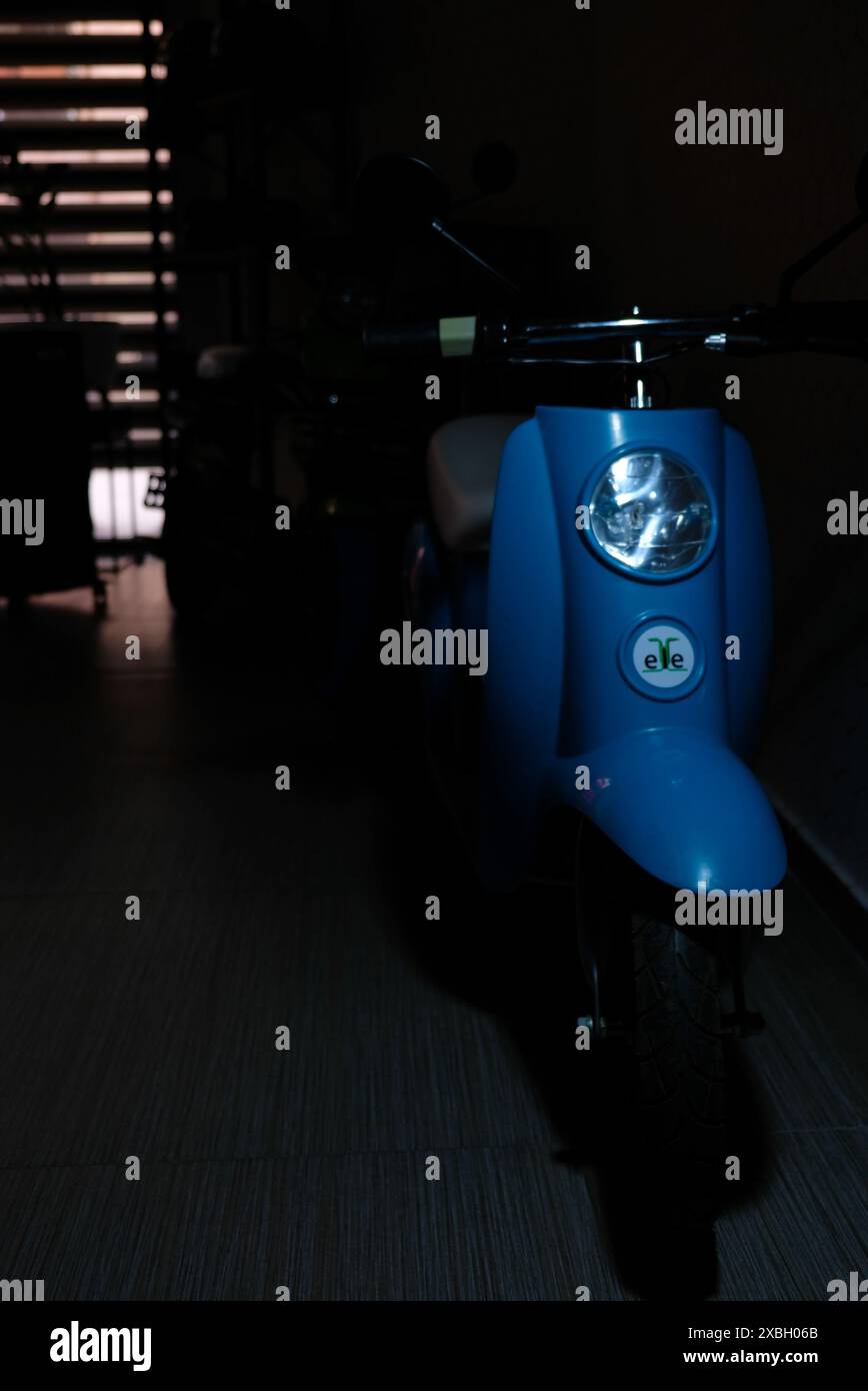 Blue electric scooter Stock Photo - Alamy