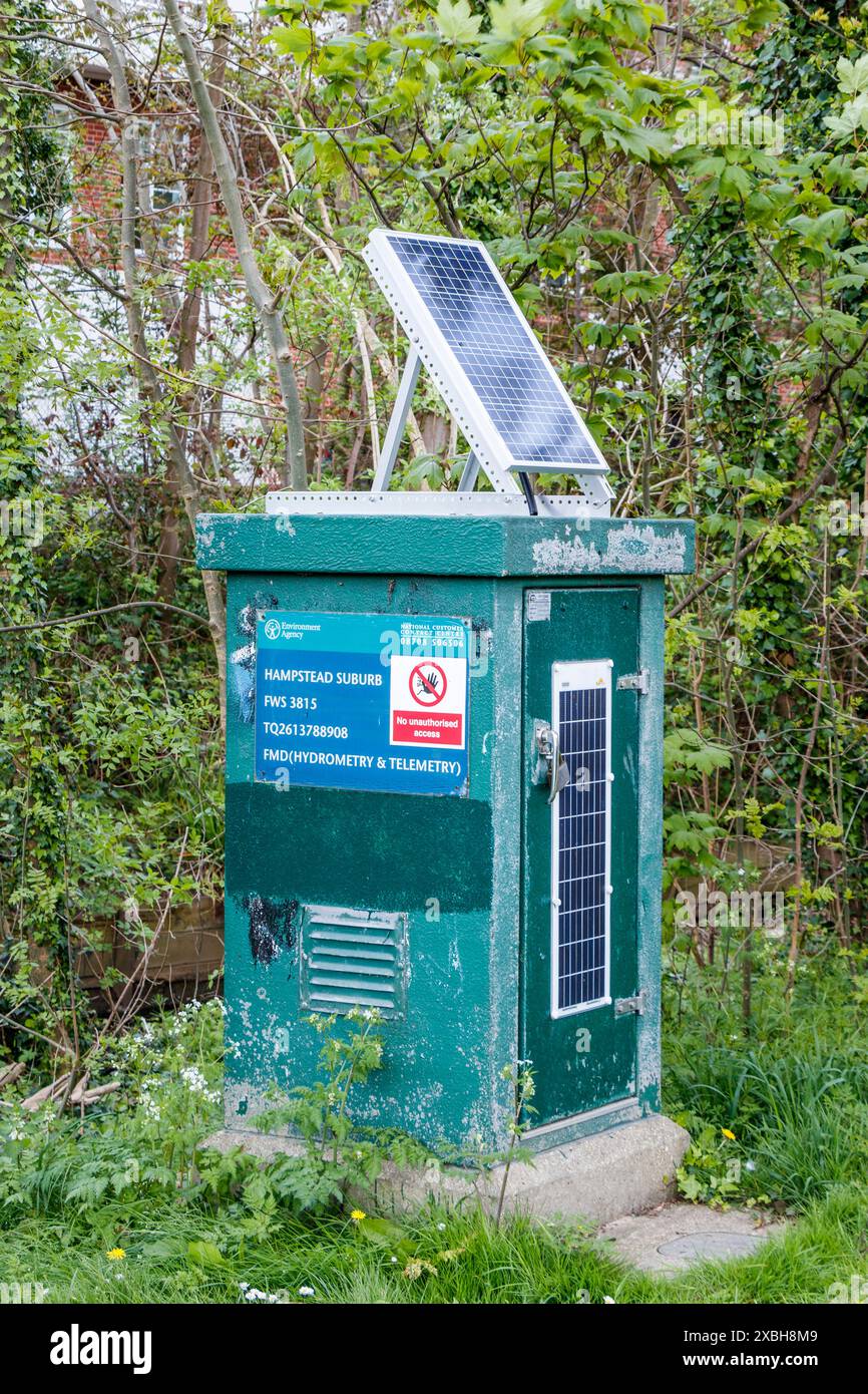 Environment Agency hydrometry unit situated next to Mutton Brook in ...