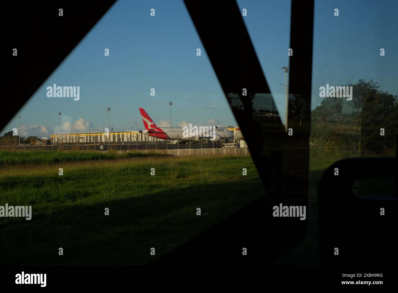 Red tailplane with the flying kangaroo logo of a QANTAS plane viewed ...