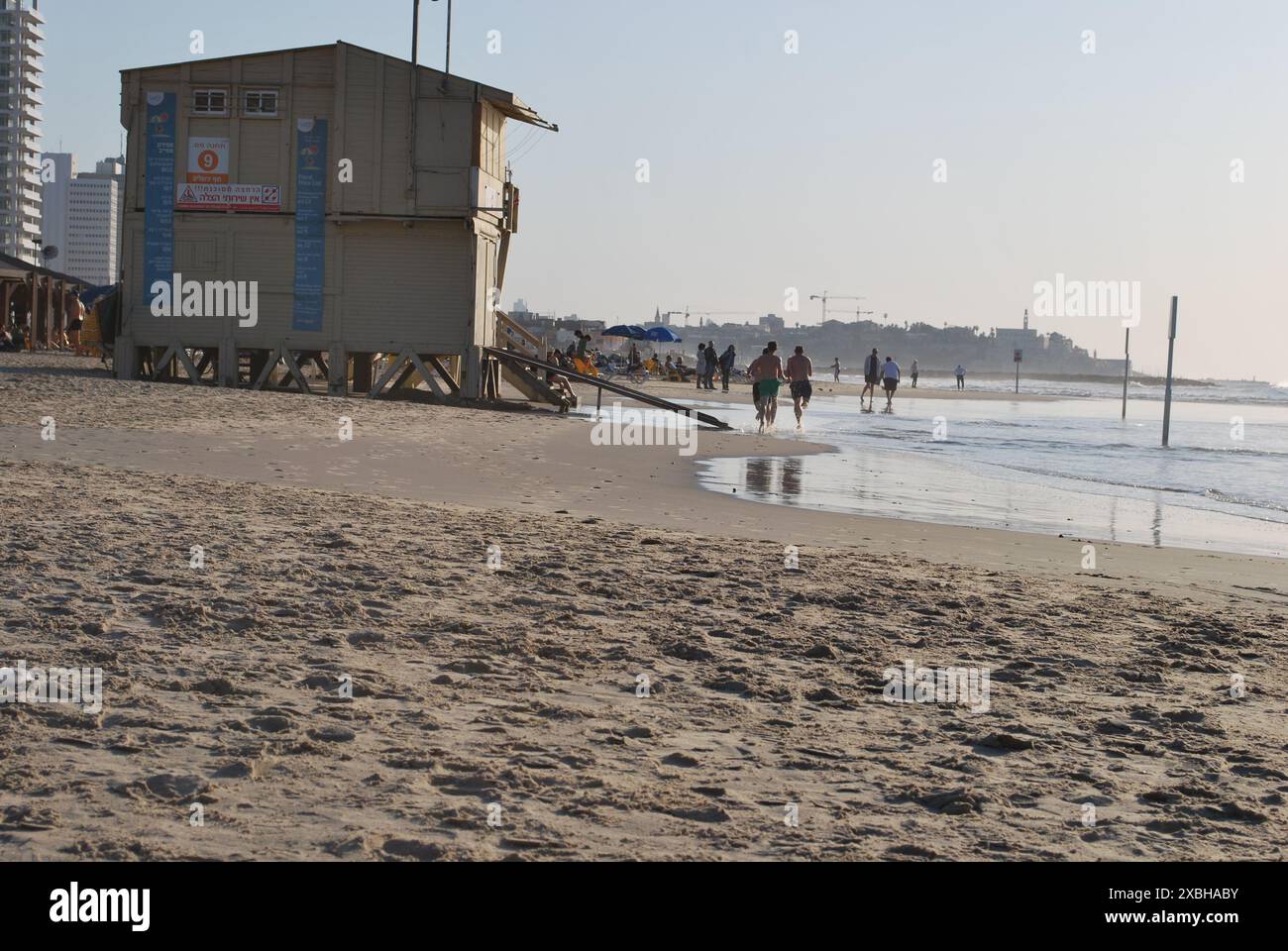 Sunset on the beach in Tel Aviv, Israel Stock Photo - Alamy