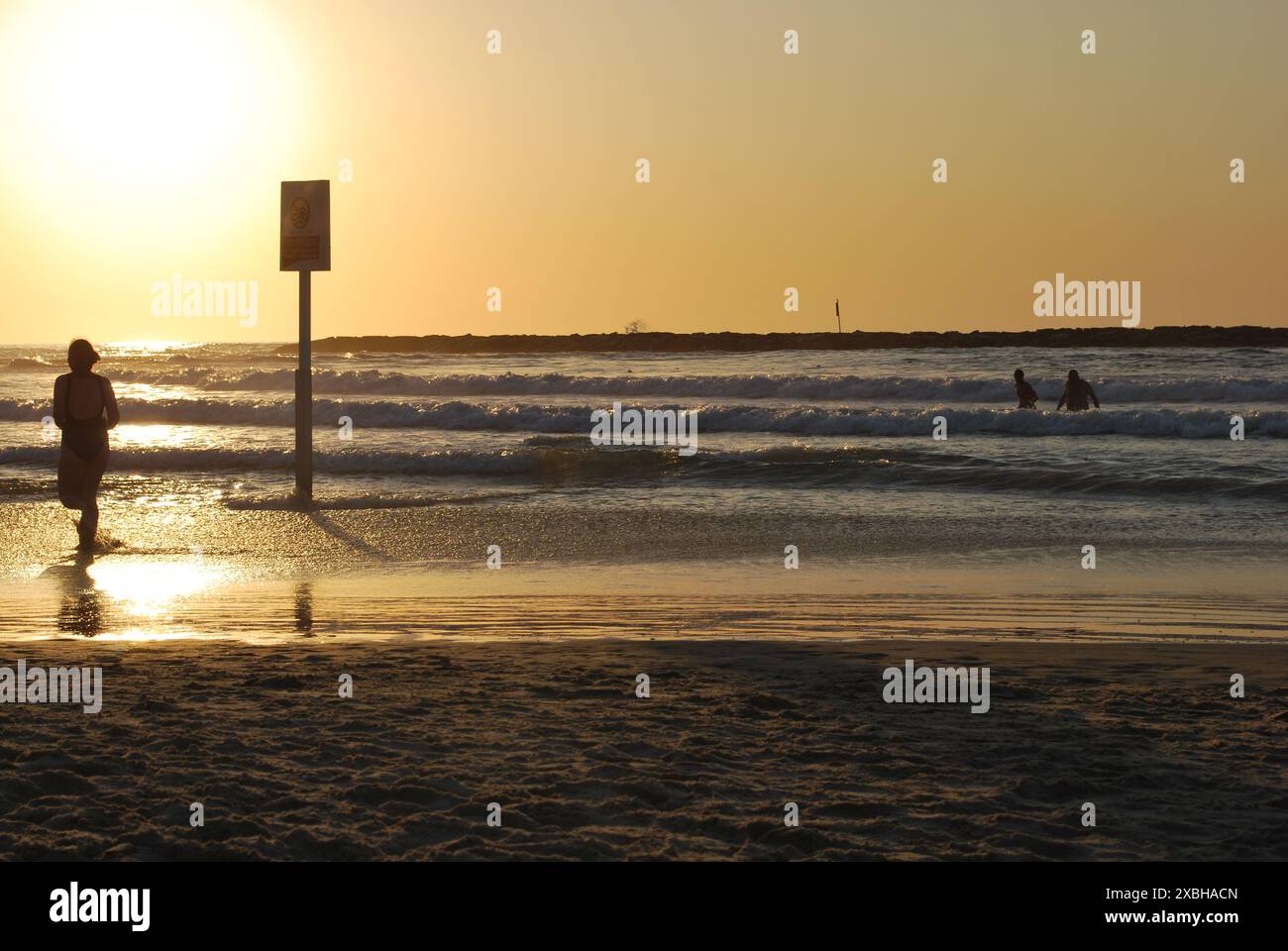 Sunset on the beach in Tel Aviv, Israel Stock Photo - Alamy