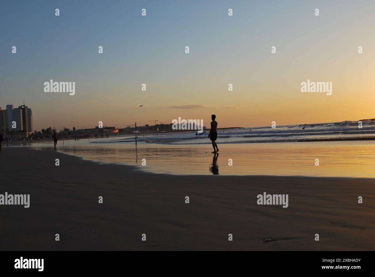 Sunset on the beach in Tel Aviv, Israel Stock Photo - Alamy