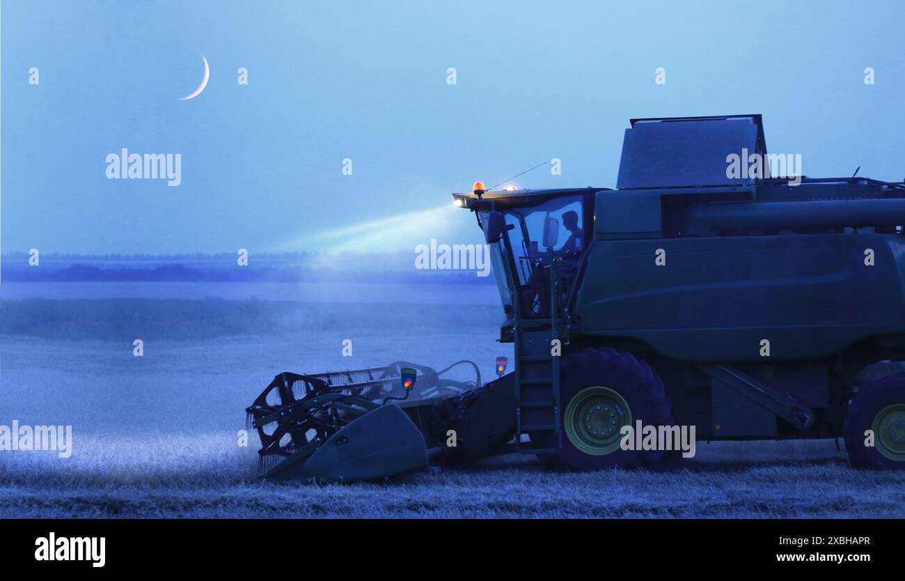 Cleaning wheat crop night combine hi-res stock photography and images ...
