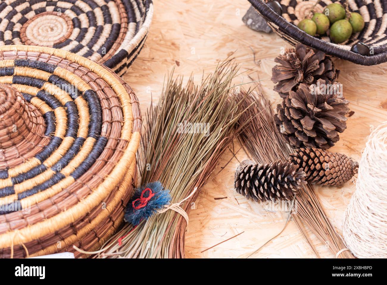 overhead view of a still life with natural objects and a basket made of ...