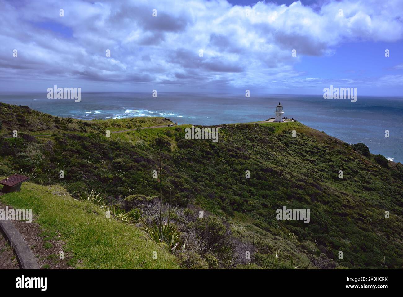 Seas meet and the lighthouse of Cape Reinga, New Zealand Stock Photo ...