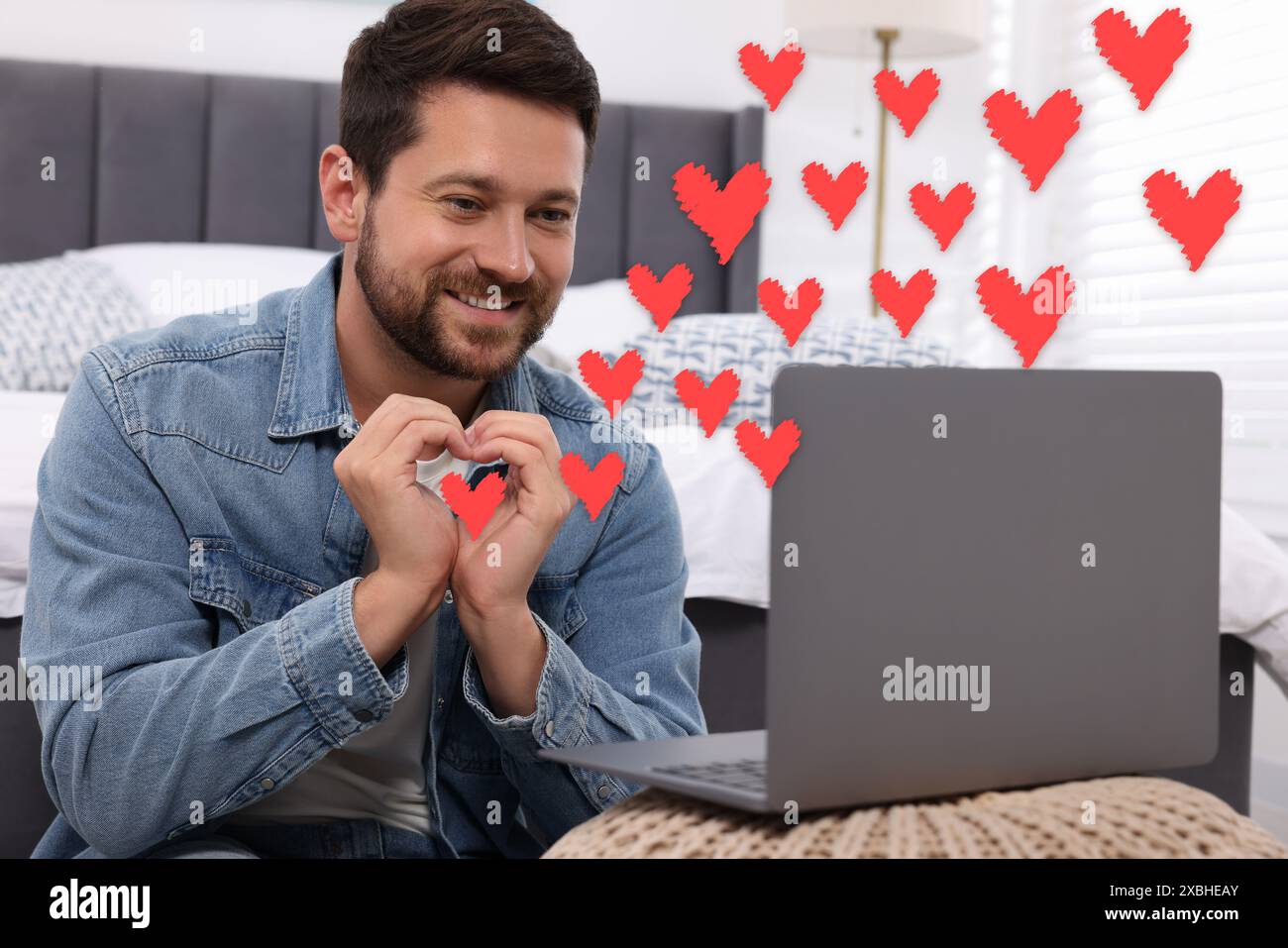 Long distance relationship. Man having video chat with his loved one ...