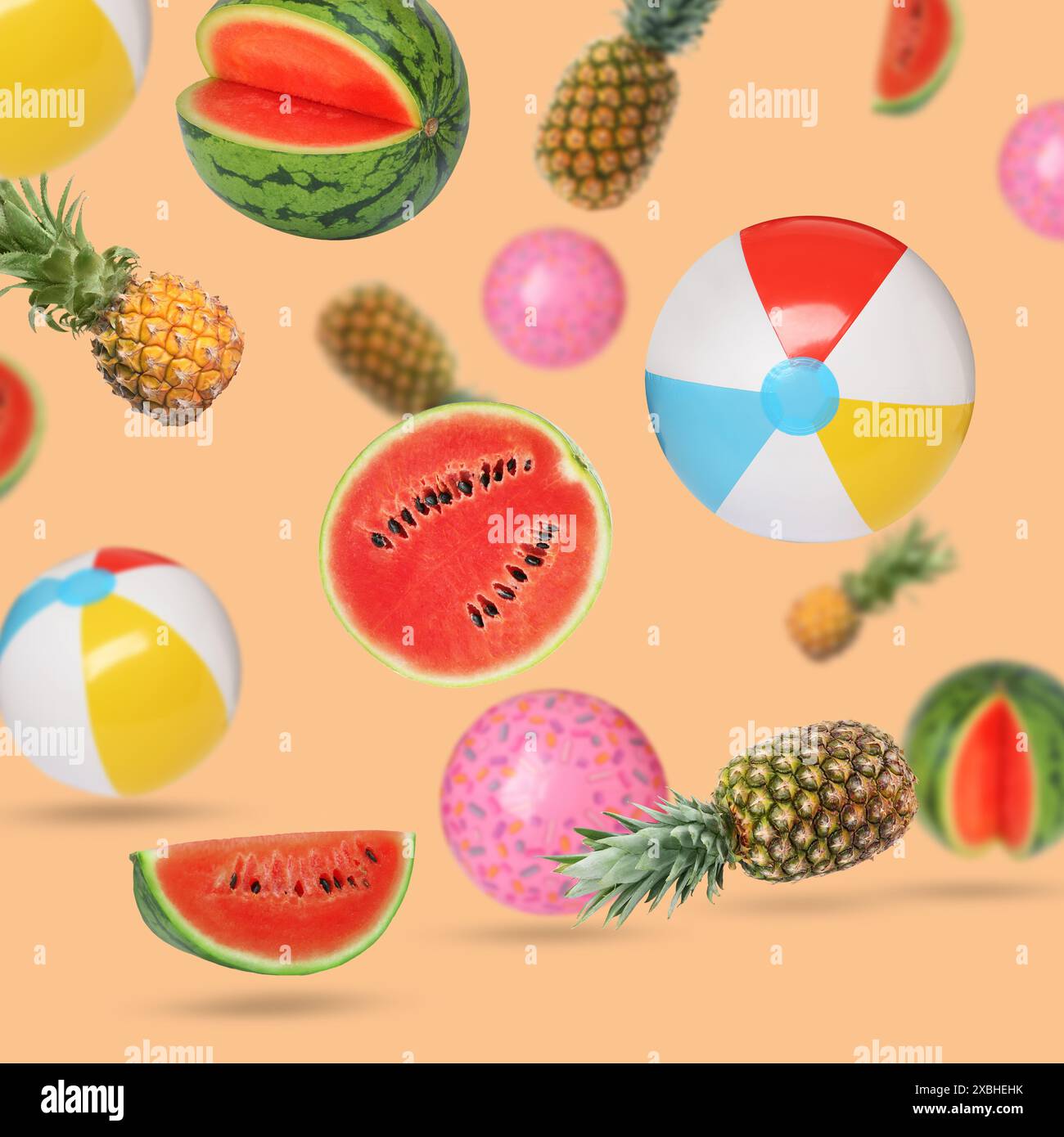 Summer party. Inflatable balls and fruits in air on peach color ...