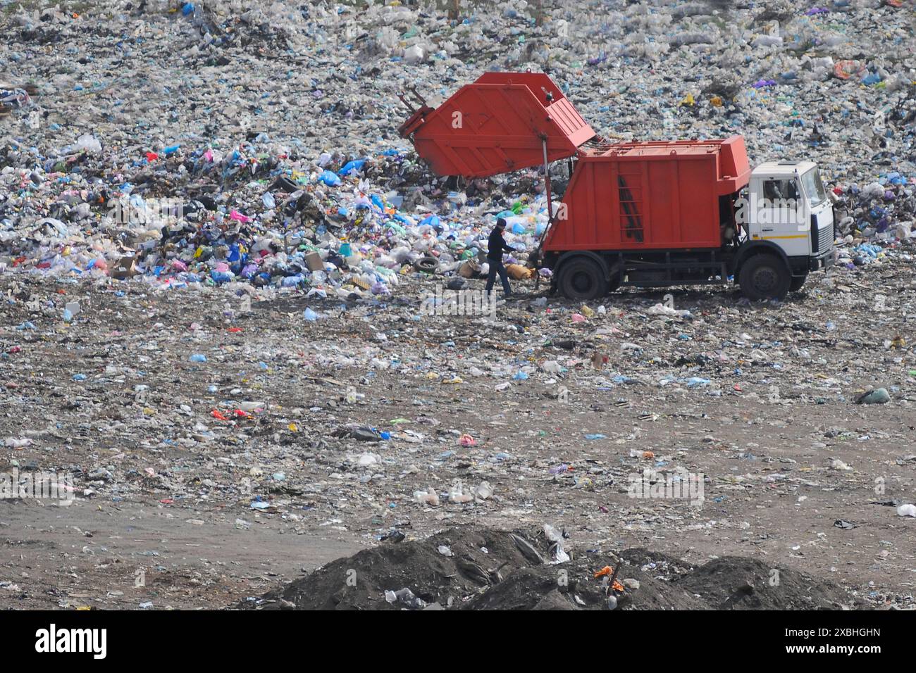 dustmen at work on a dump Stock Photo - Alamy