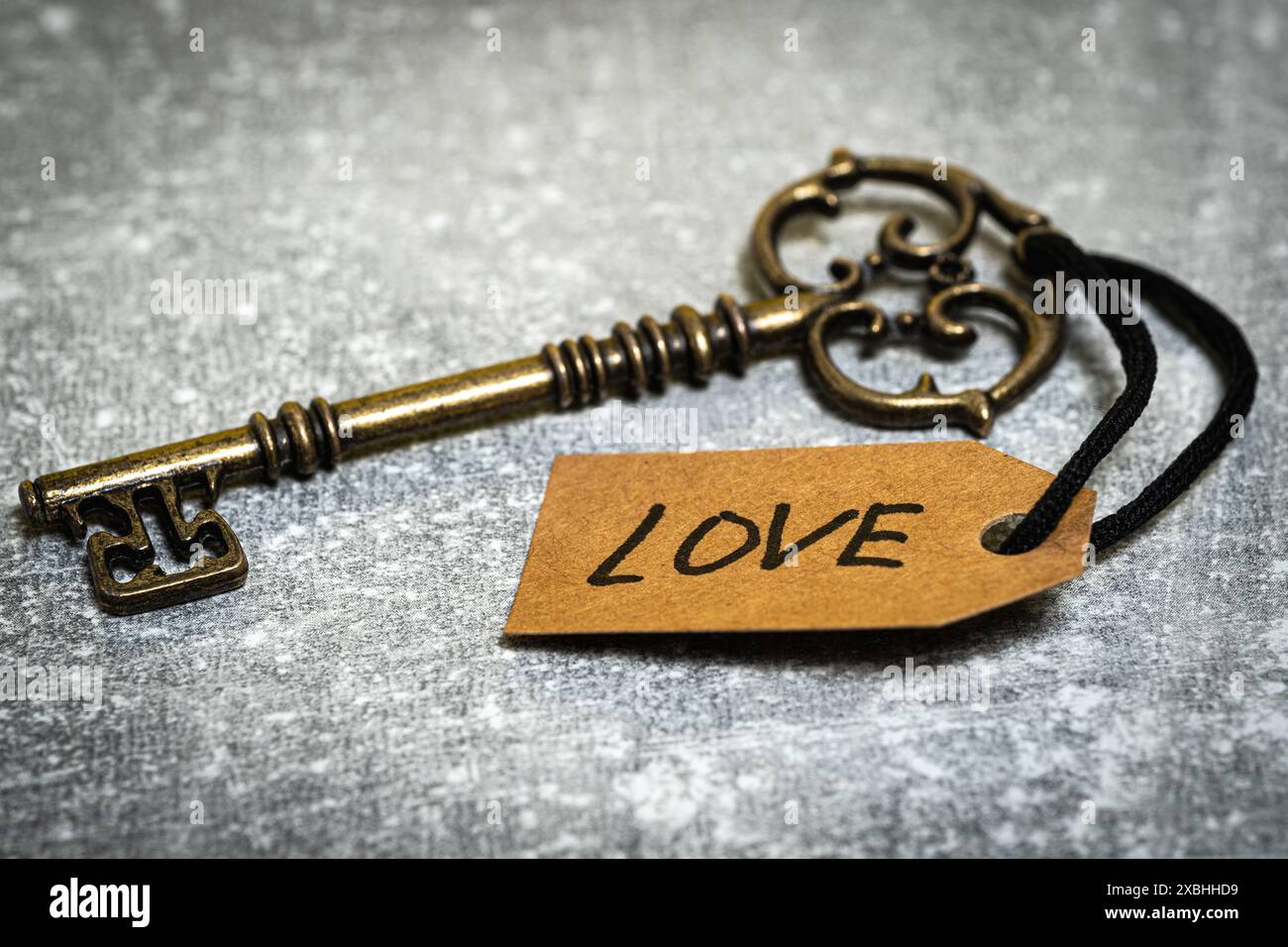 Old key with love message on a rustic background with copy space Stock ...