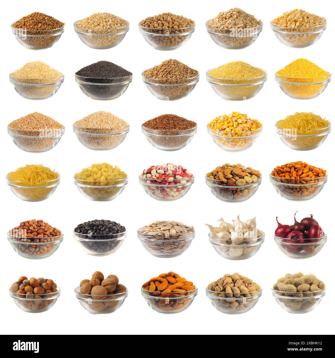 Choice dry food to utensils on a white background Stock Photo - Alamy