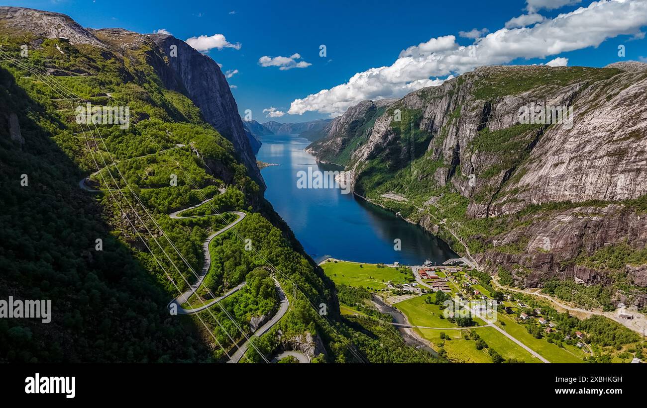 A scenic view of a winding road snaking its way through the dramatic ...