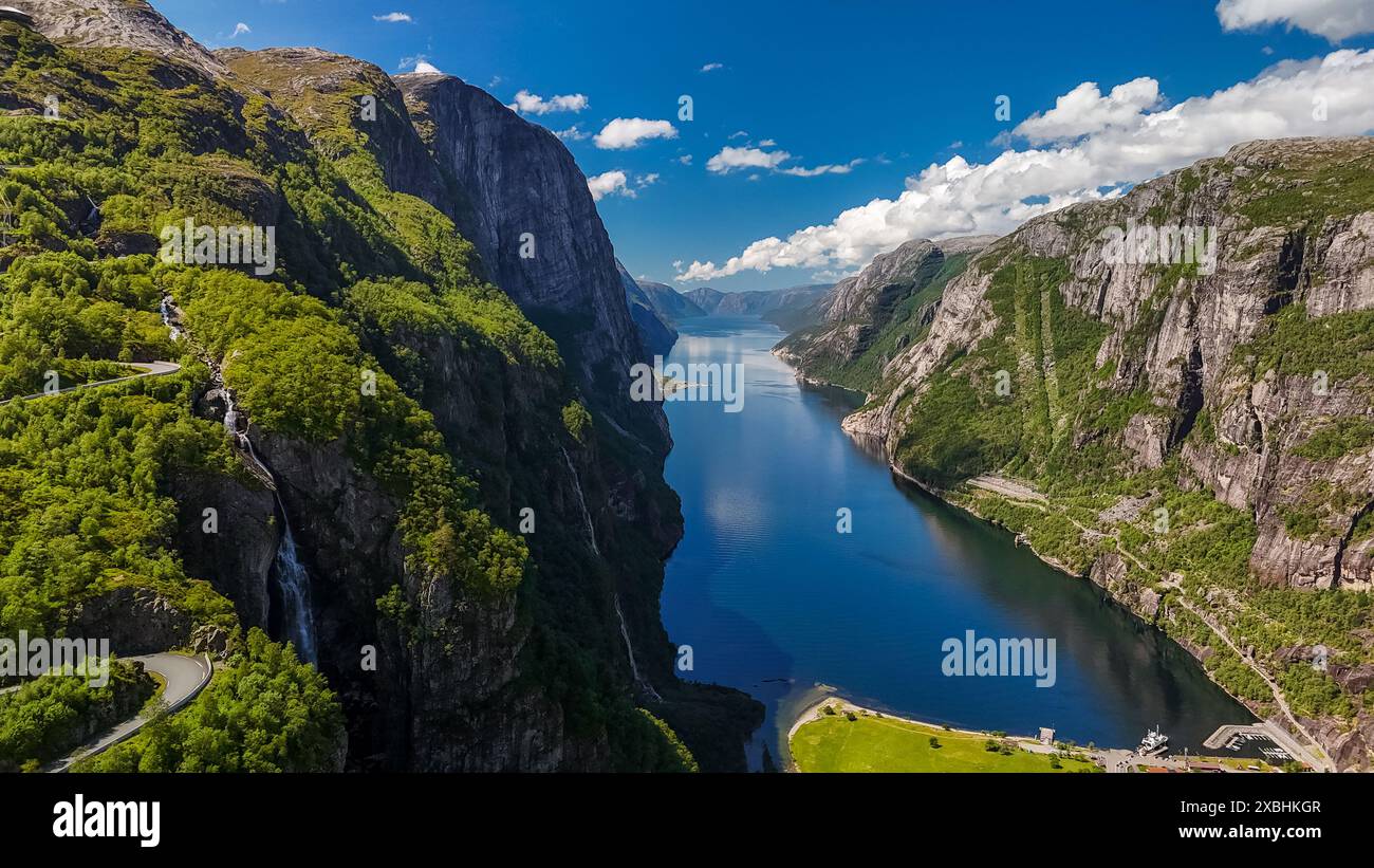 An aerial view of a picturesque fjord in Norway, showcasing towering ...