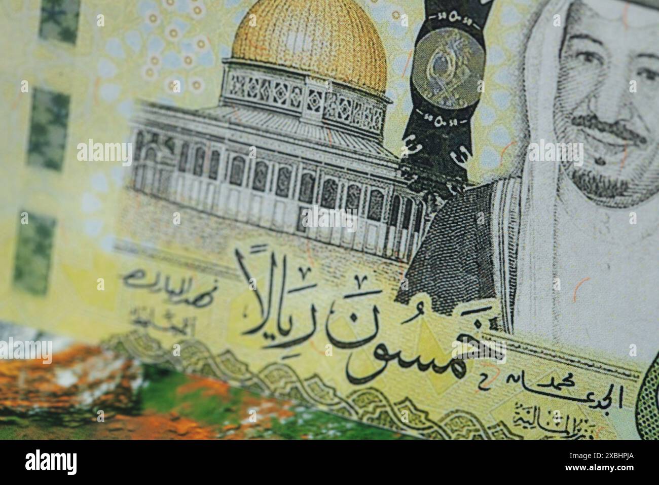 Saudi Arabia money, 50 Saudi Riyal banknote against the background of ...