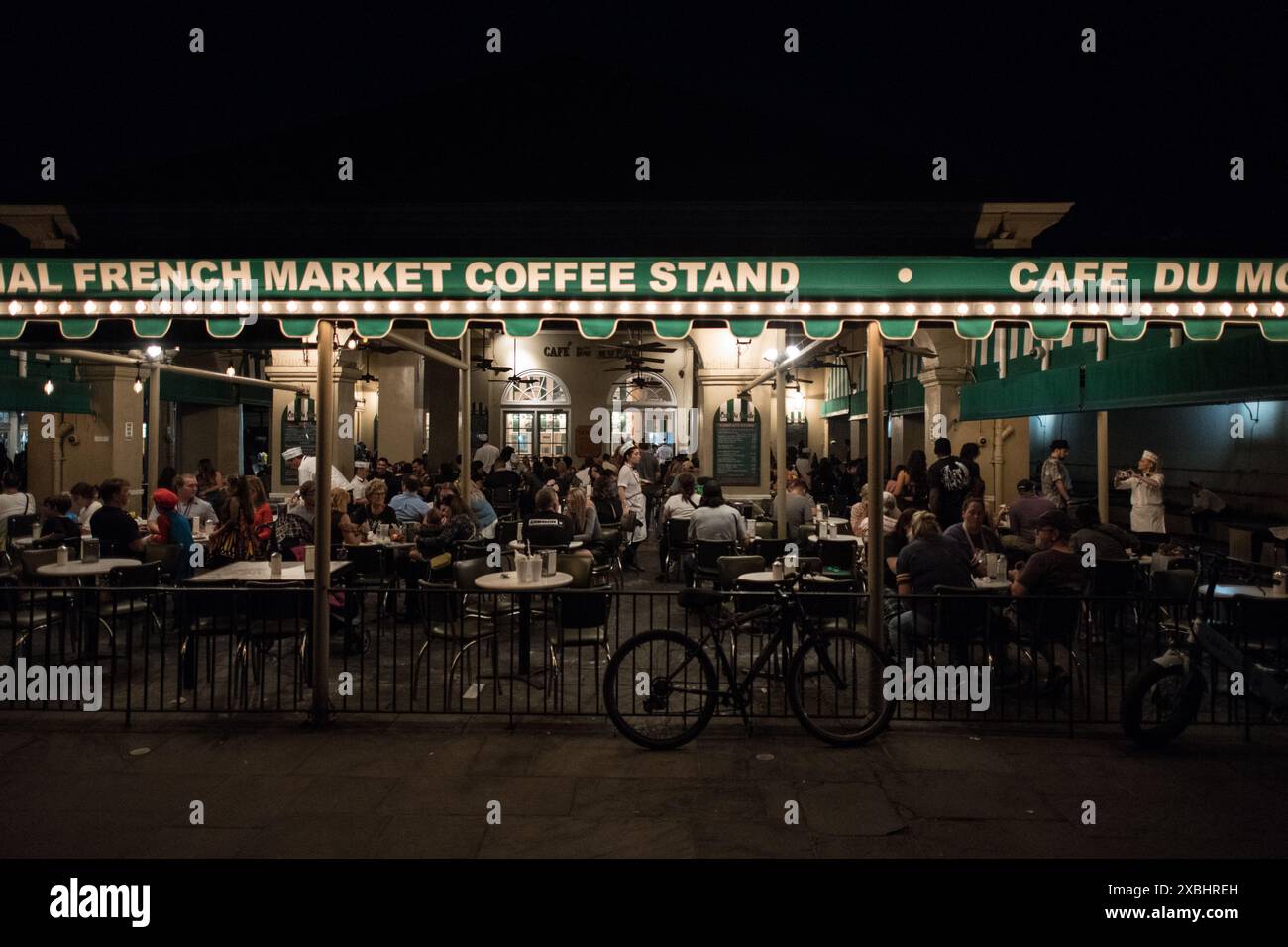 A lively night at Cafe Du Monde, a historic New Orleans landmark known ...