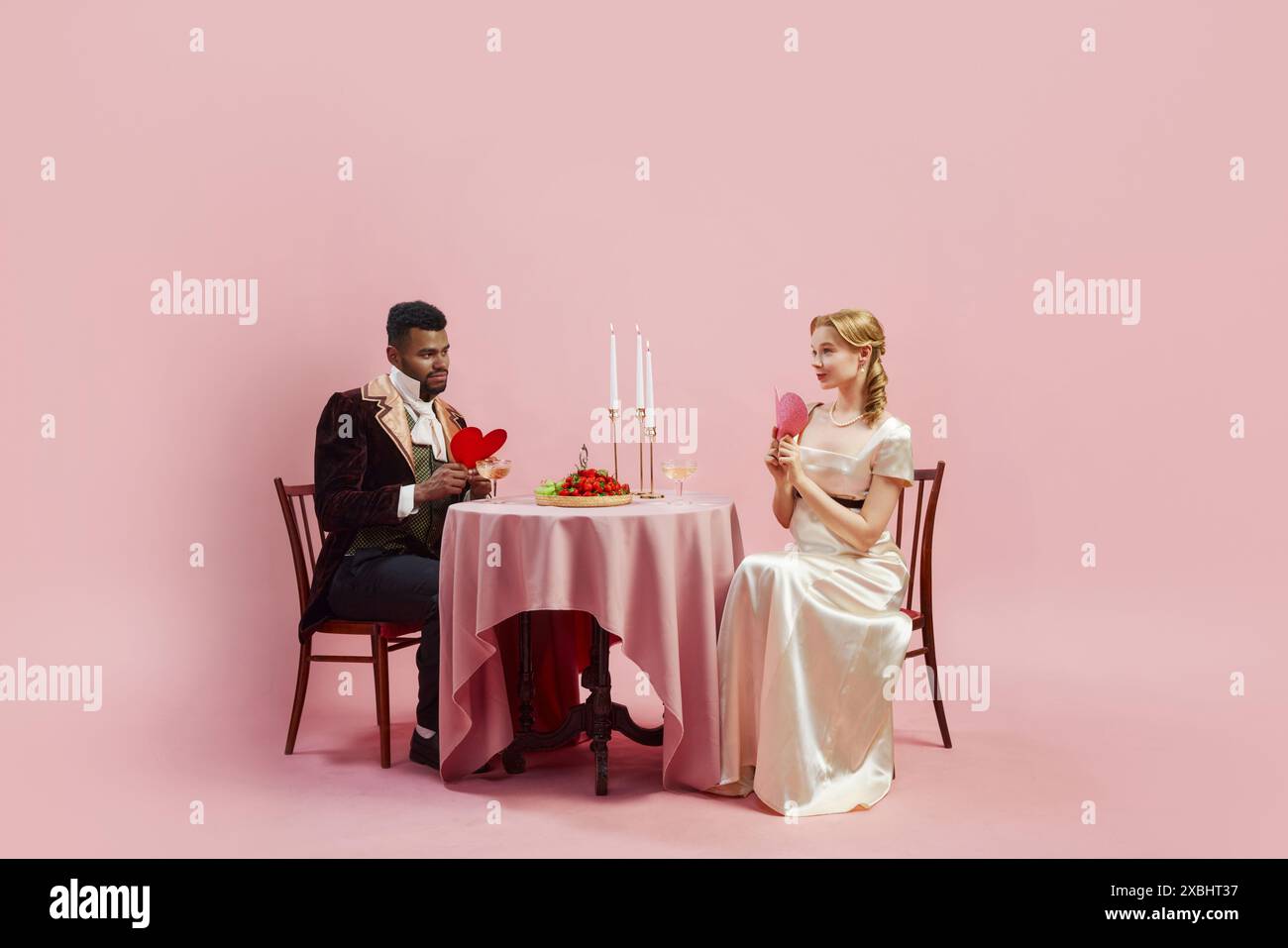 Historical scene with couple in Renaissance attire, enjoying moment of ...