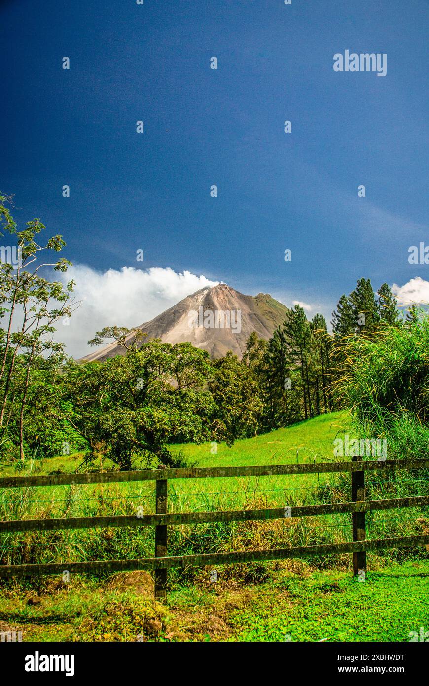 Volcano arenal in clouds hi-res stock photography and images - Alamy