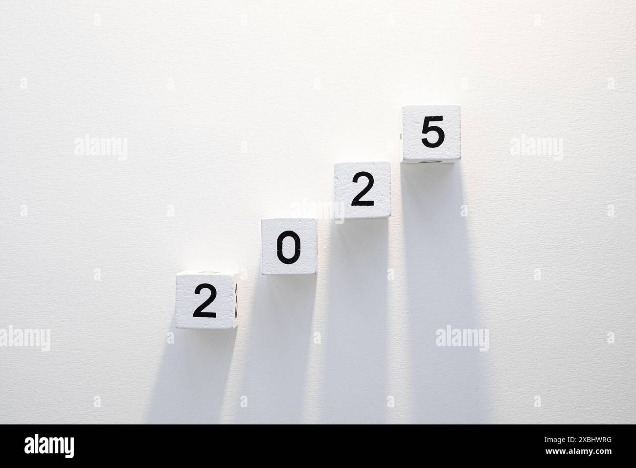 White Cubes Displaying The Year 2025 n Steps On A White Background ...