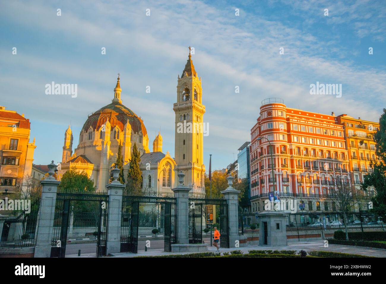 San Manuel y San Benito church viewed from The Retiro park at dawn ...
