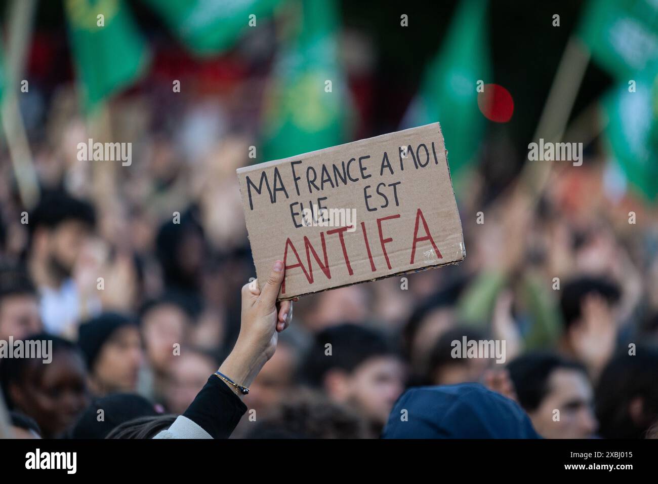 June 11, 2024, Paris, France: A protester holds a placard that says ...
