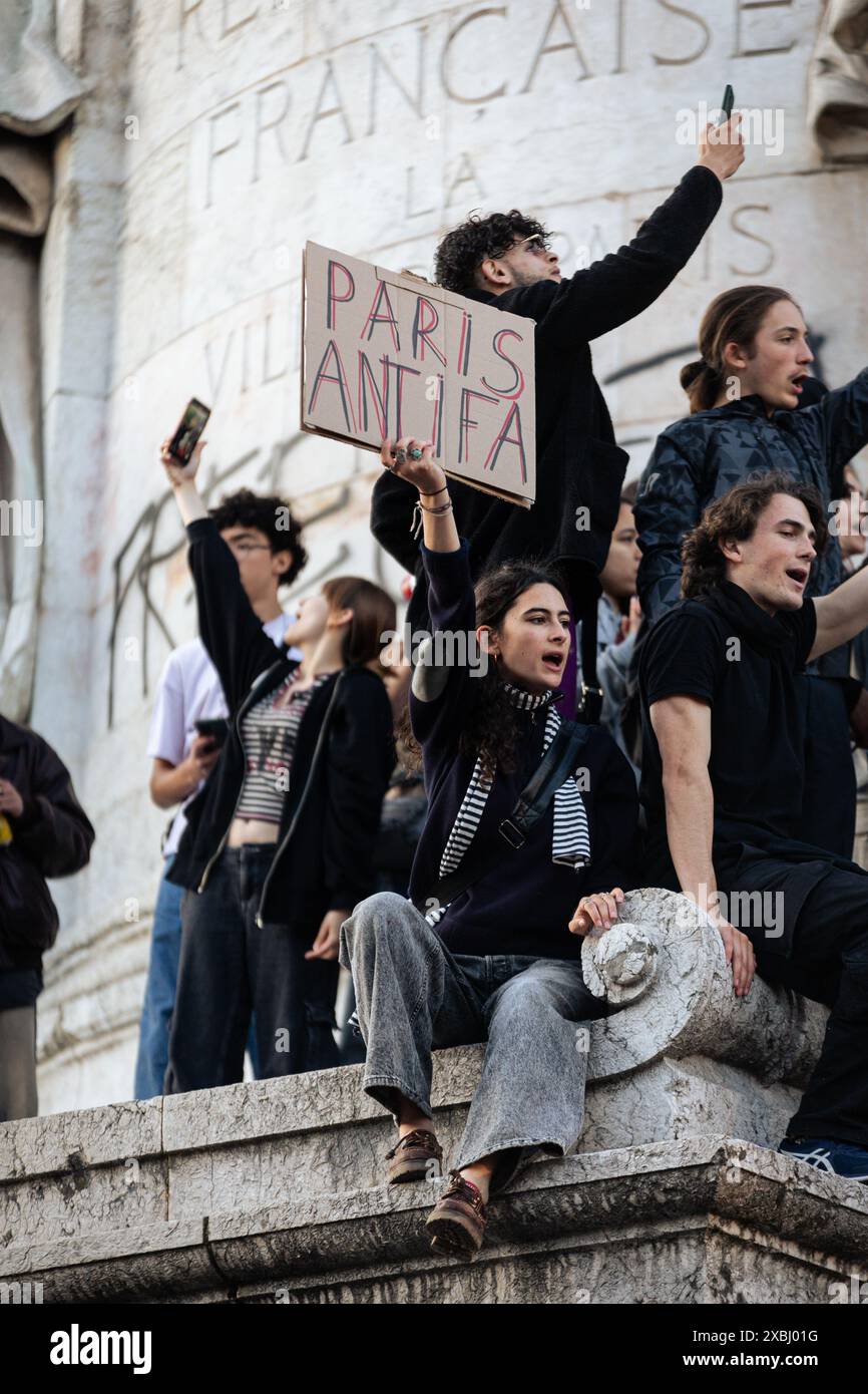 June 11, 2024, Paris, France: A protester holds a placard that says ...