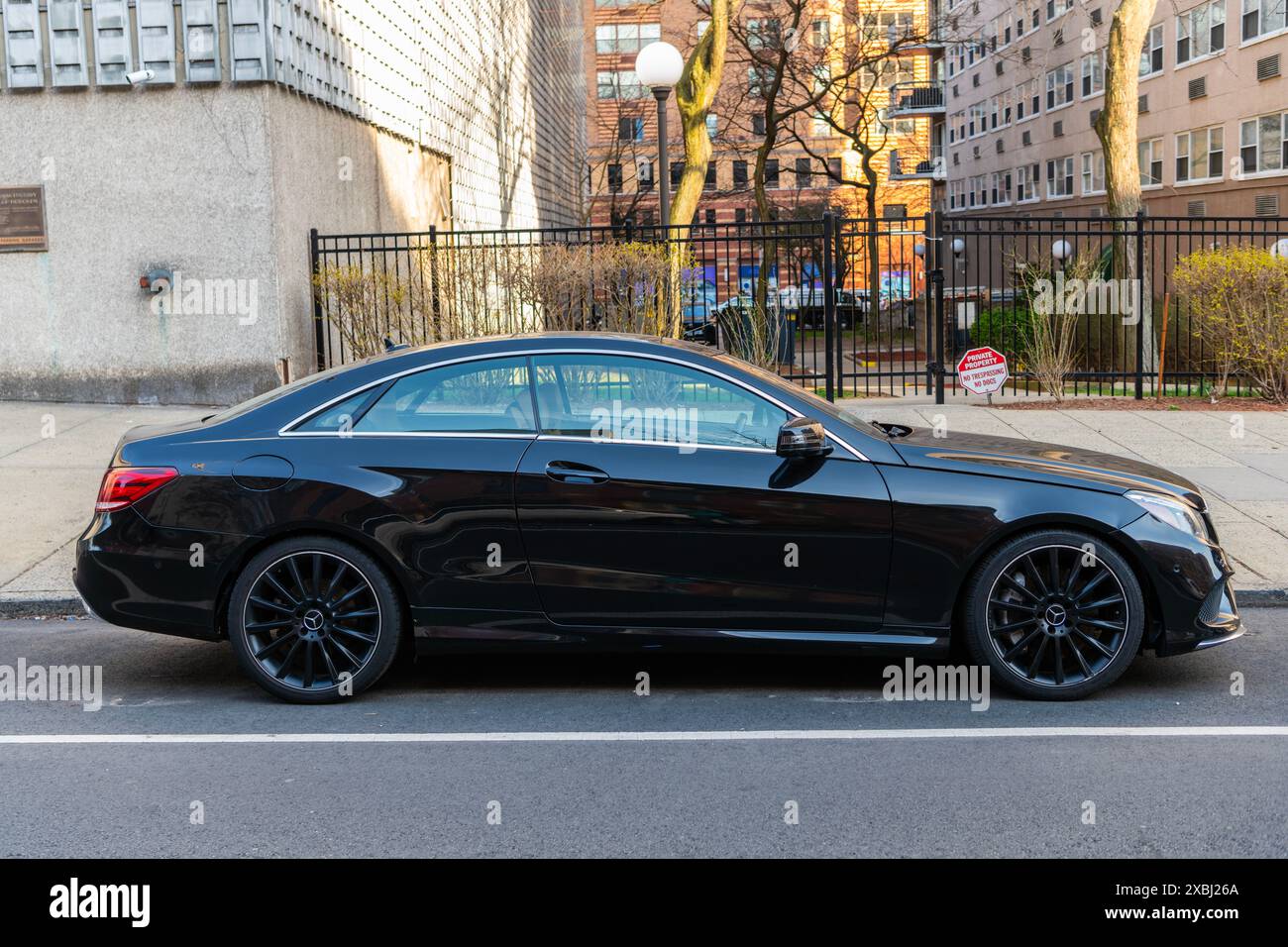 New York City, USA - March 15, 2024: 2014 Mercedes Benz E550 luxury car ...