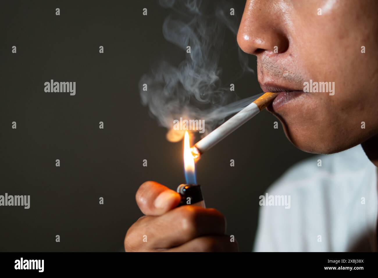 Woman lighting cigar hi-res stock photography and images - Alamy