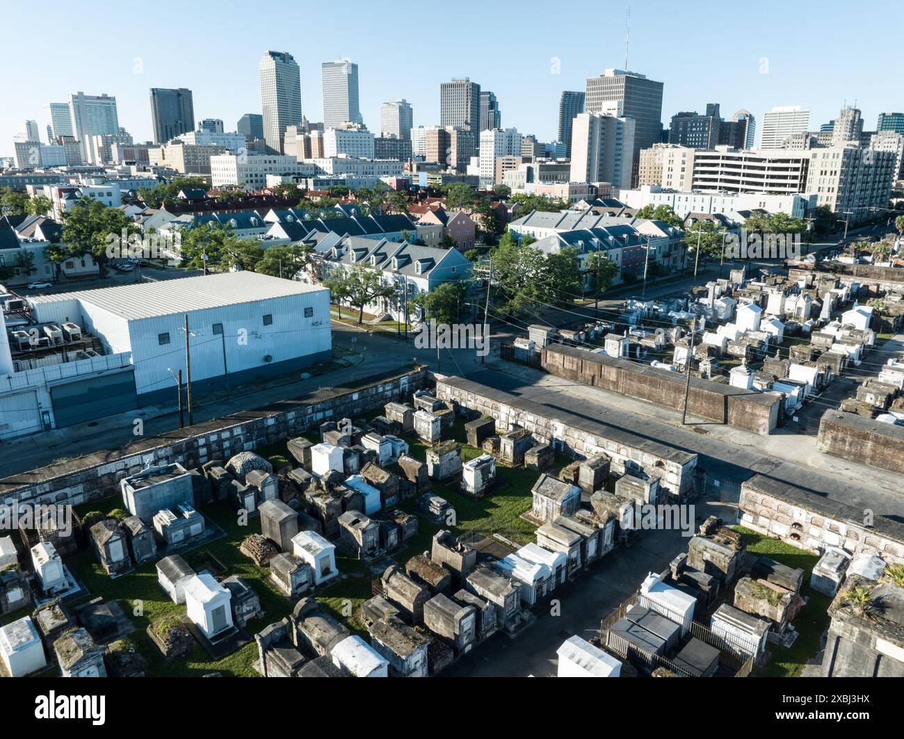 Aerial view of a historic New Orleans cemetery with countless tombs and ...