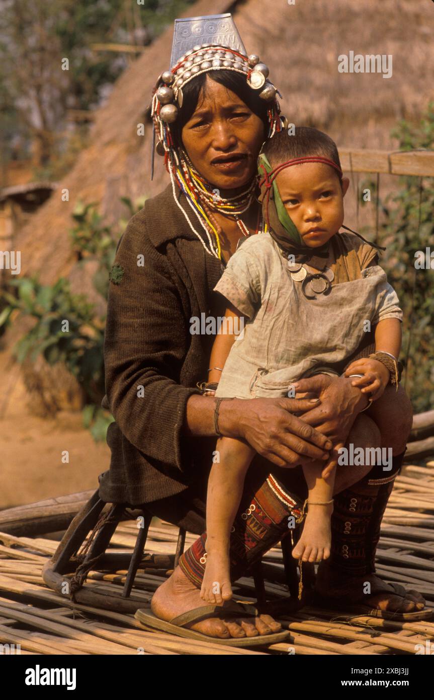 Akha Hill Tribe indigenous people of Northern Thailand 1995. Mother and ...