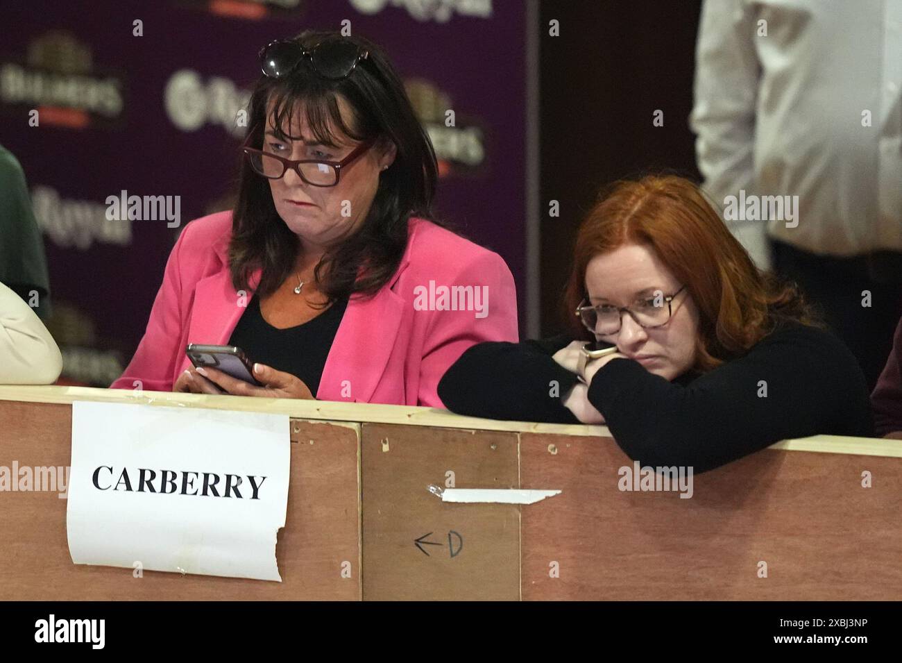 Michelle Gildernew from Sinn Fein (left) listens to the results at TF ...