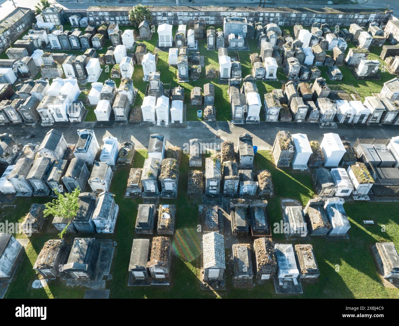 Aerial view of a historic New Orleans cemetery with countless tombs and ...