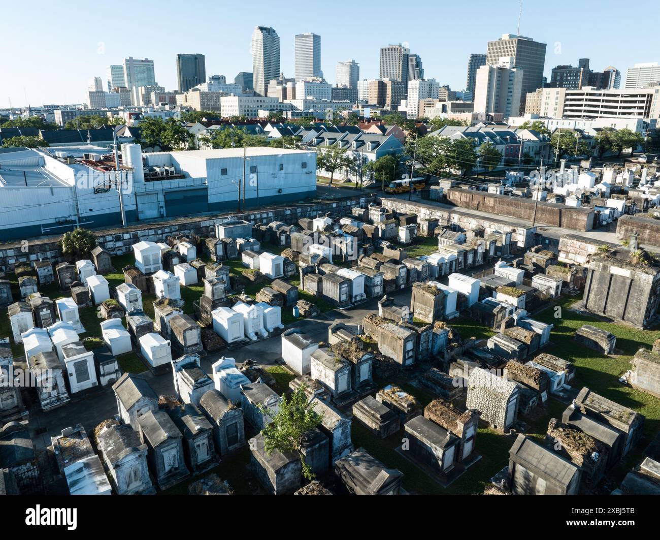 Aerial view of a historic New Orleans cemetery with countless tombs and ...