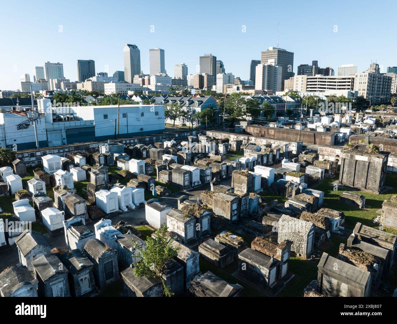 Aerial view of a historic New Orleans cemetery with countless tombs and ...