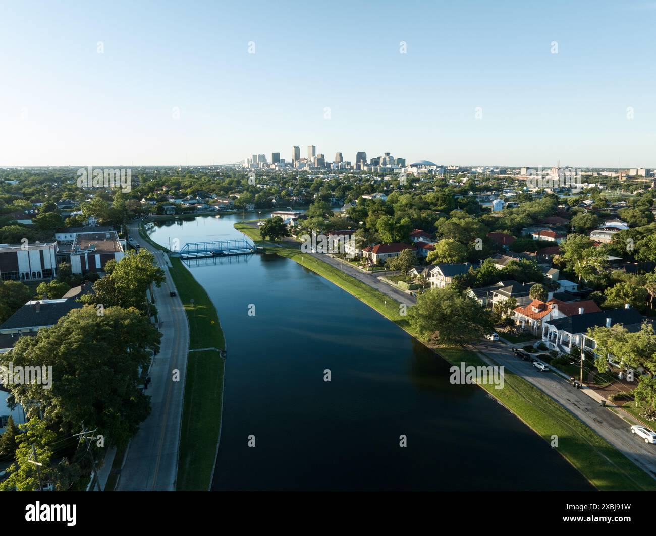 Aerial view of the historic Bayou St. John winding through a lush New ...