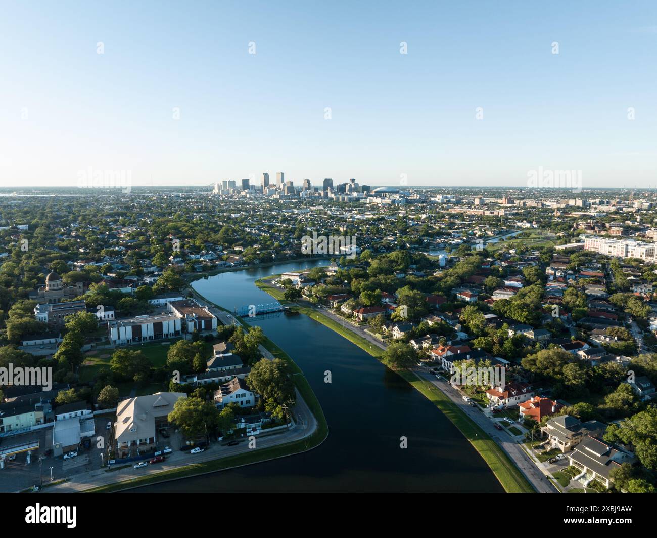 Aerial view of the historic Bayou St. John winding through a lush New ...