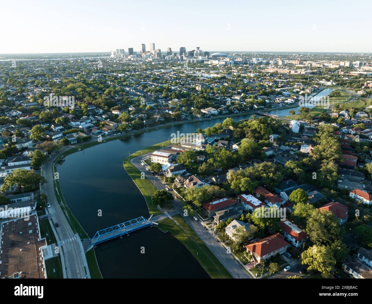 Aerial view of the historic Bayou St. John winding through a lush New ...
