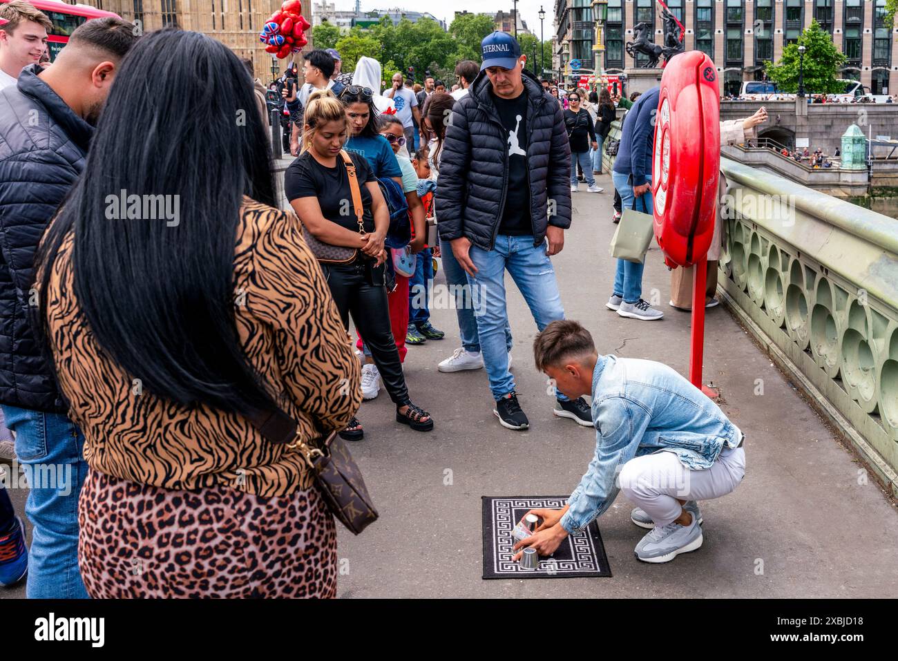 Cup and Ball Tricksters, Westminster Bridge, London, UK Stock Photo - Alamy
