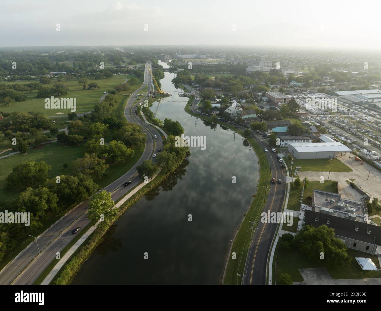 Aerial view of the historic Bayou St. John winding through a lush New ...