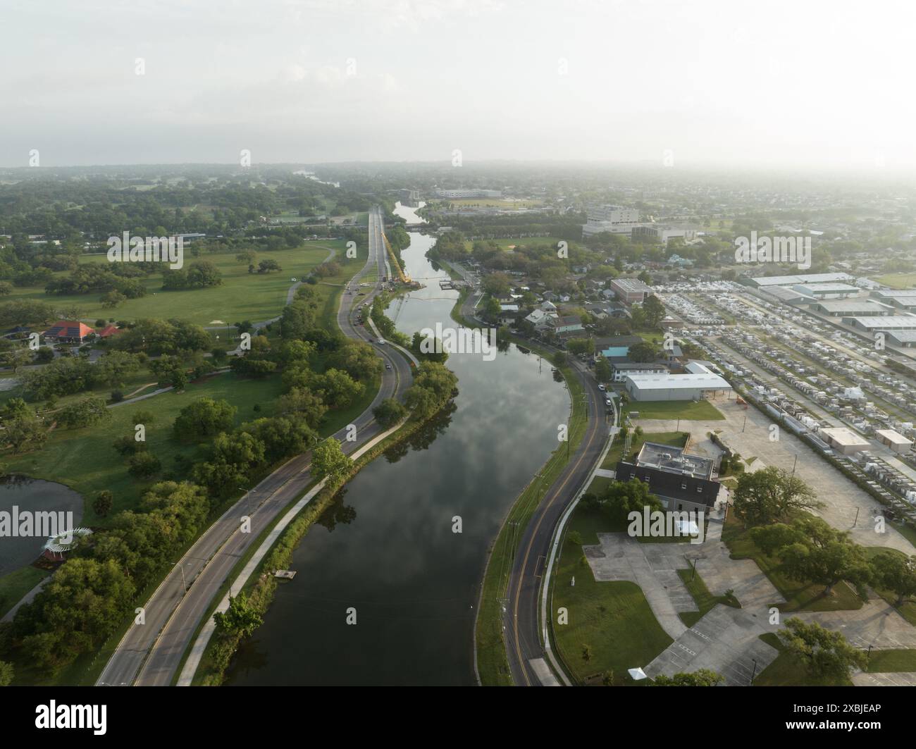 Aerial view of the historic Bayou St. John winding through a lush New ...