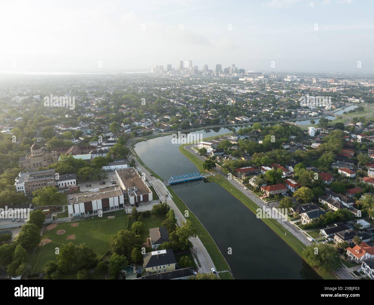 Aerial view of the historic Bayou St. John winding through a lush New ...