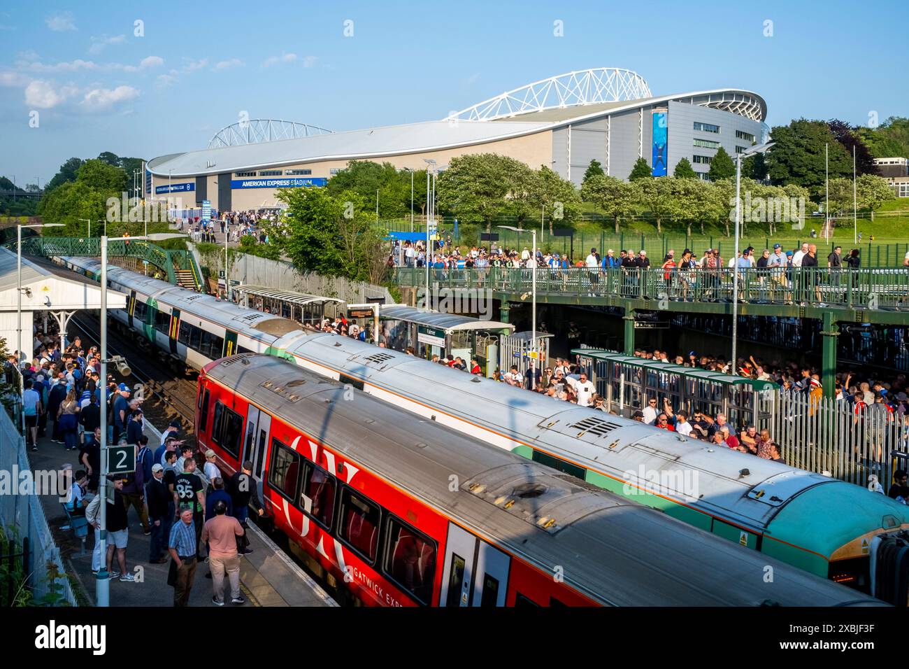 Fans of Brighton and Hove Albion and Manchester United Wait For Trains ...