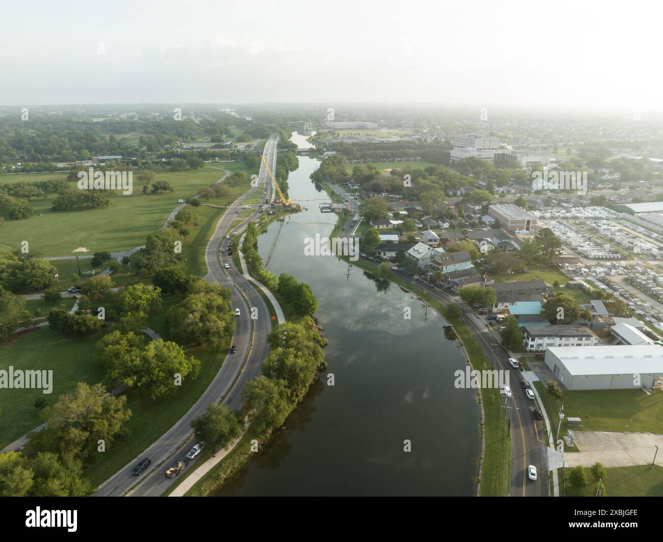 Aerial view of the historic Bayou St. John winding through a lush New ...