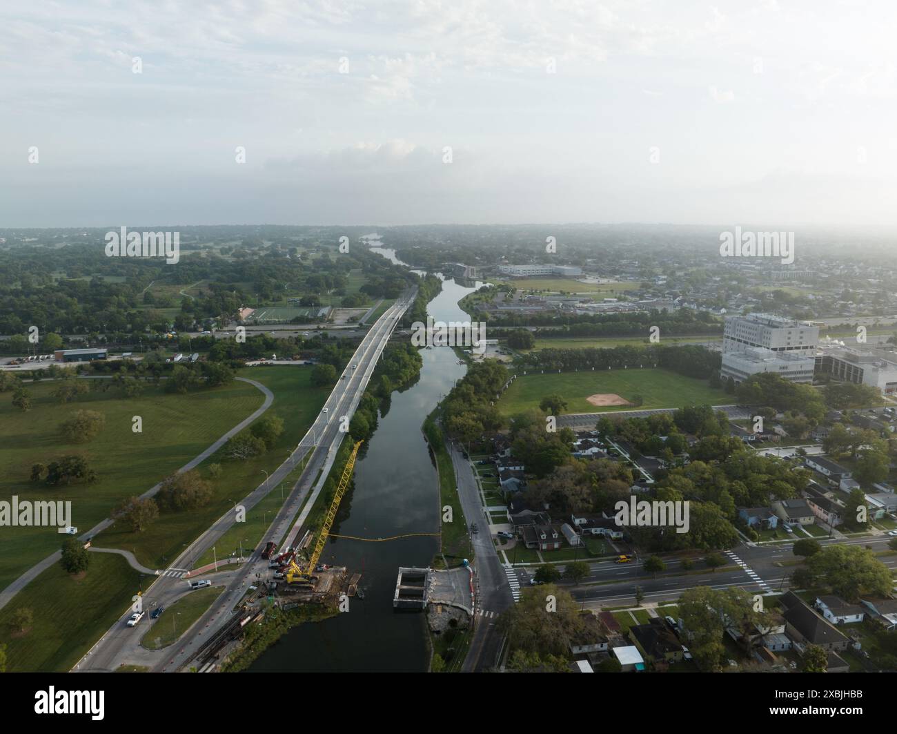 Aerial view of the historic Bayou St. John winding through a lush New ...