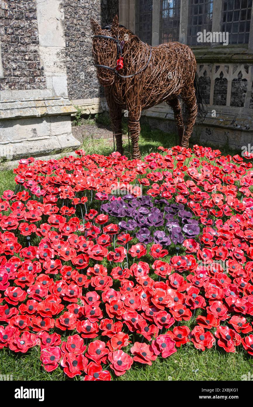 Pottery remembrance poppies and woven war horse statue Stock Photo - Alamy