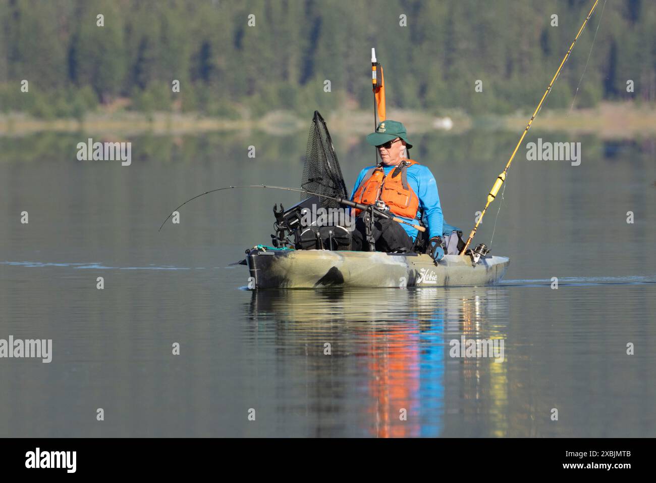 SUSANVILLE CALIFORNIA, USA – JUNE 12, 2024: A male kayak angler trolls ...