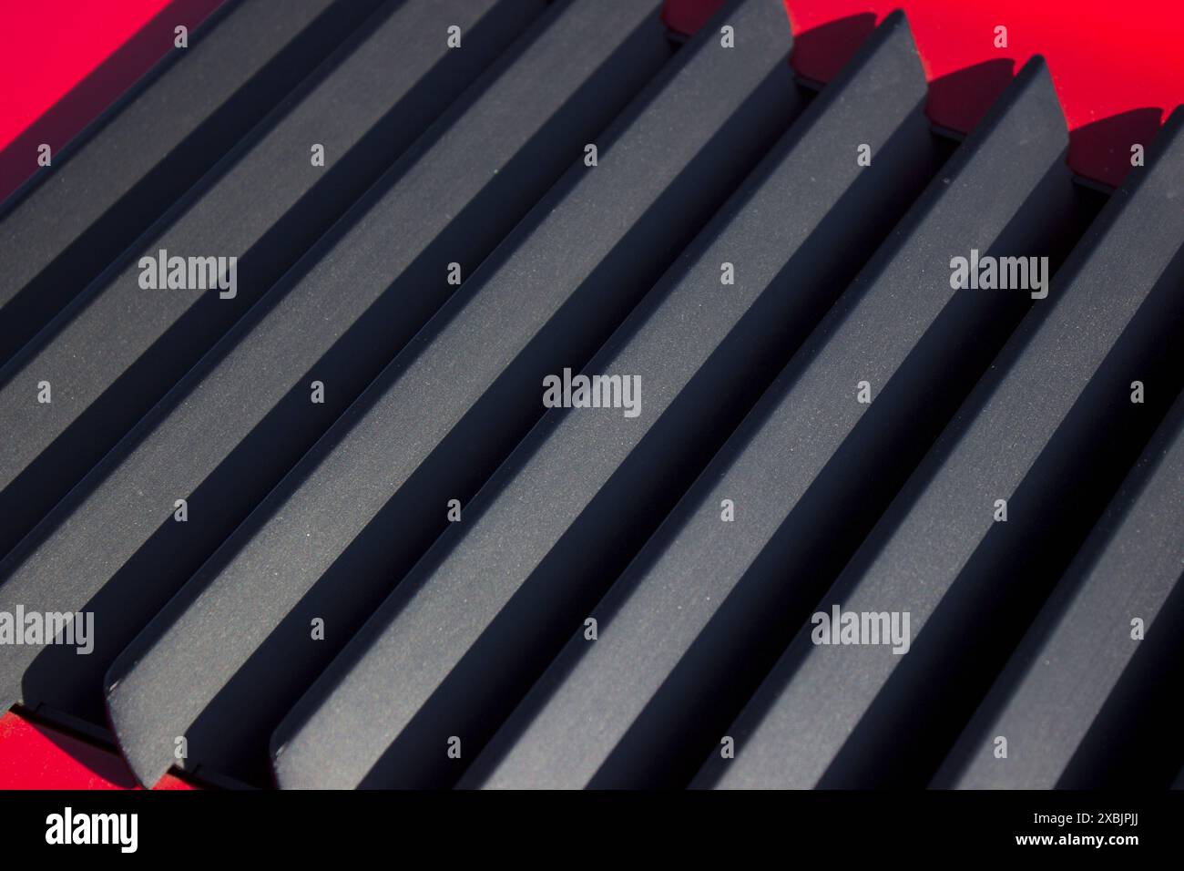 An abstract photo of an engine cover vent of a Ferrari 308 GTS Stock ...