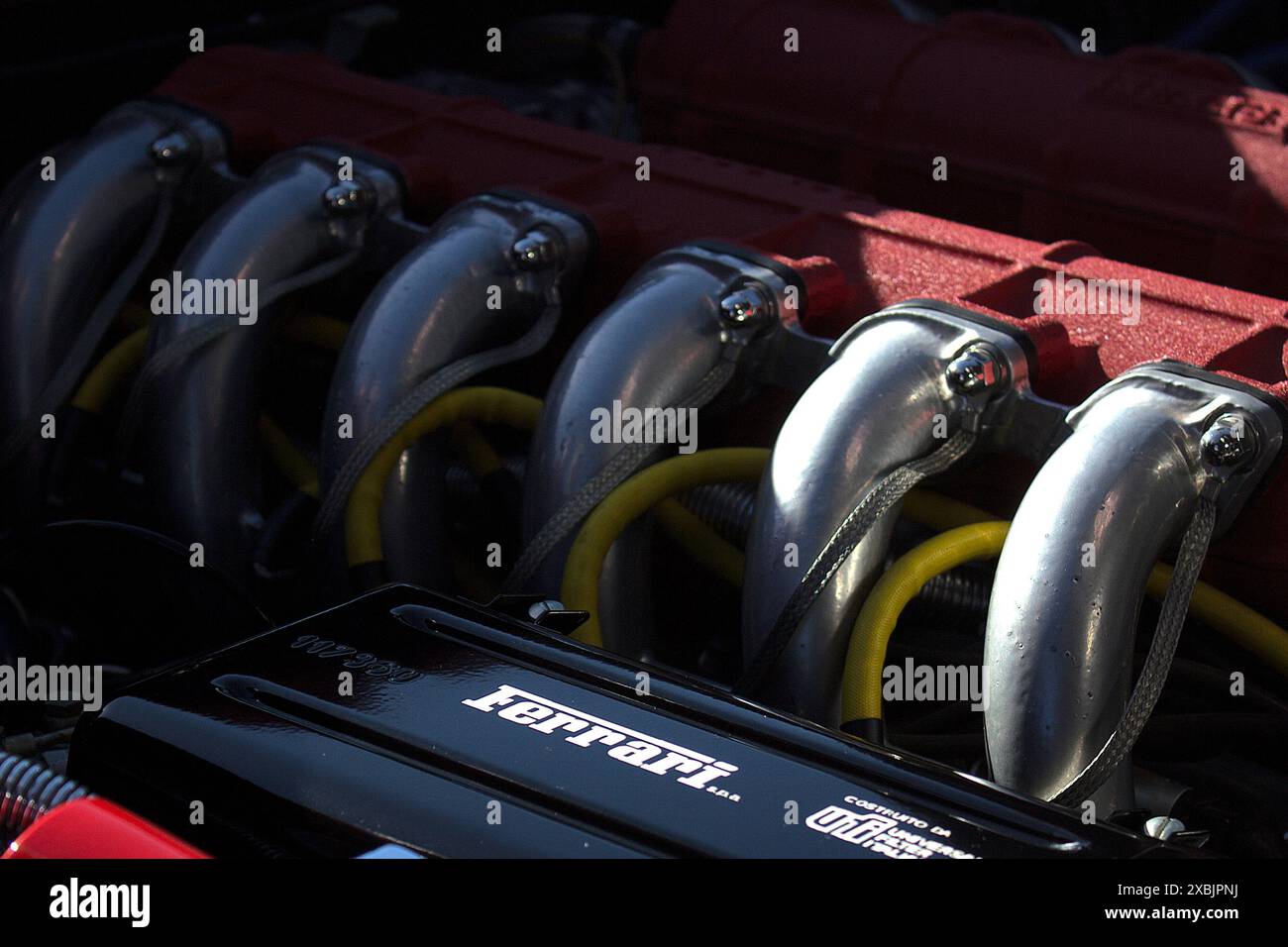 The exhaust or intake manifild of a Ferrari BB 512i Stock Photo - Alamy