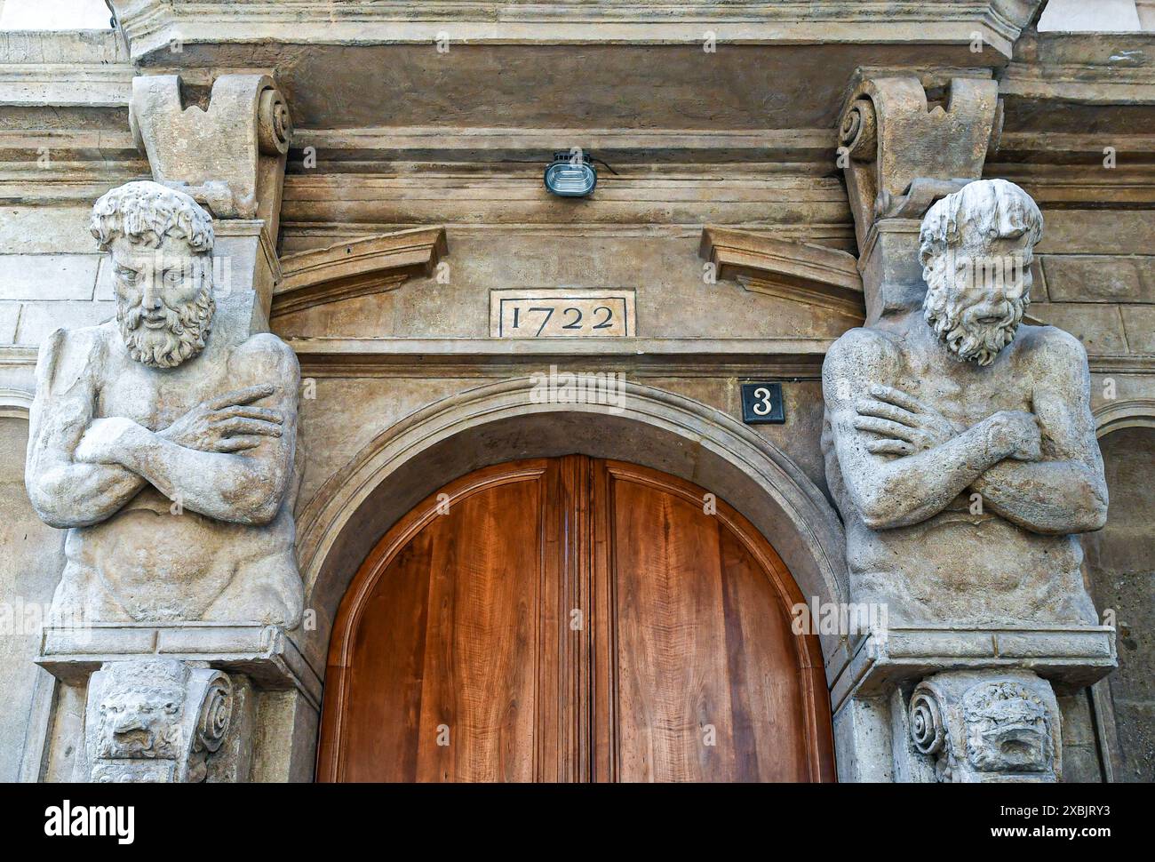 Entrance of the Casa degli Omenoni, a historic palace built in 1565 and ...