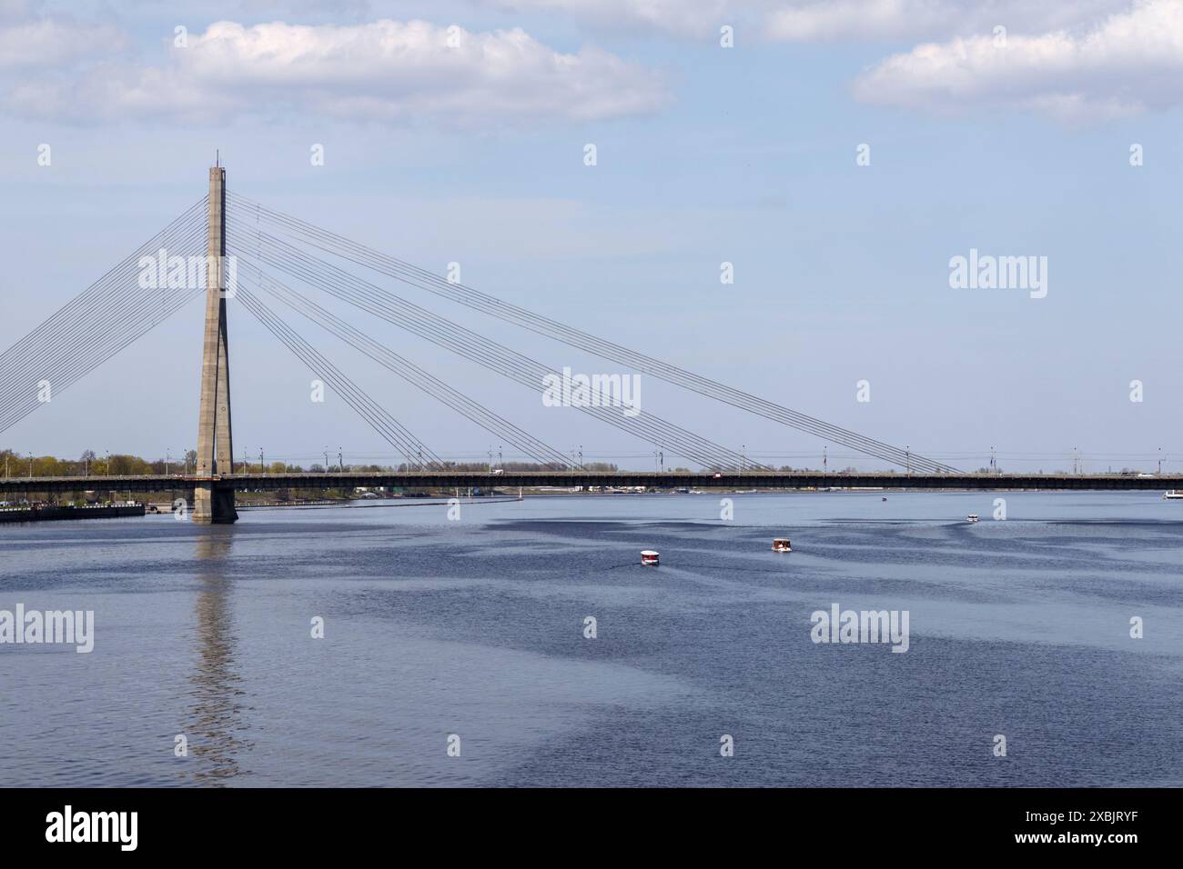 reinforced concrete bridge with metal wires over the river Stock Photo ...